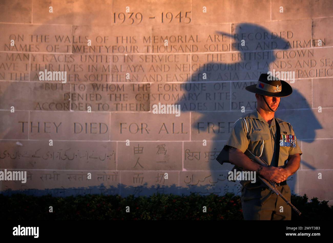 A catafalque guard rests on arms reversed as a form of respect, on ...