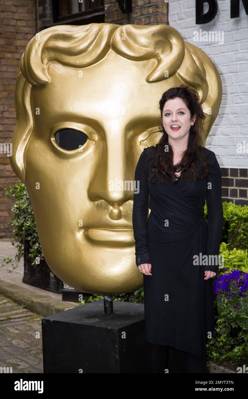 Helen Monks poses for photographers upon arrival at the British Academy ...