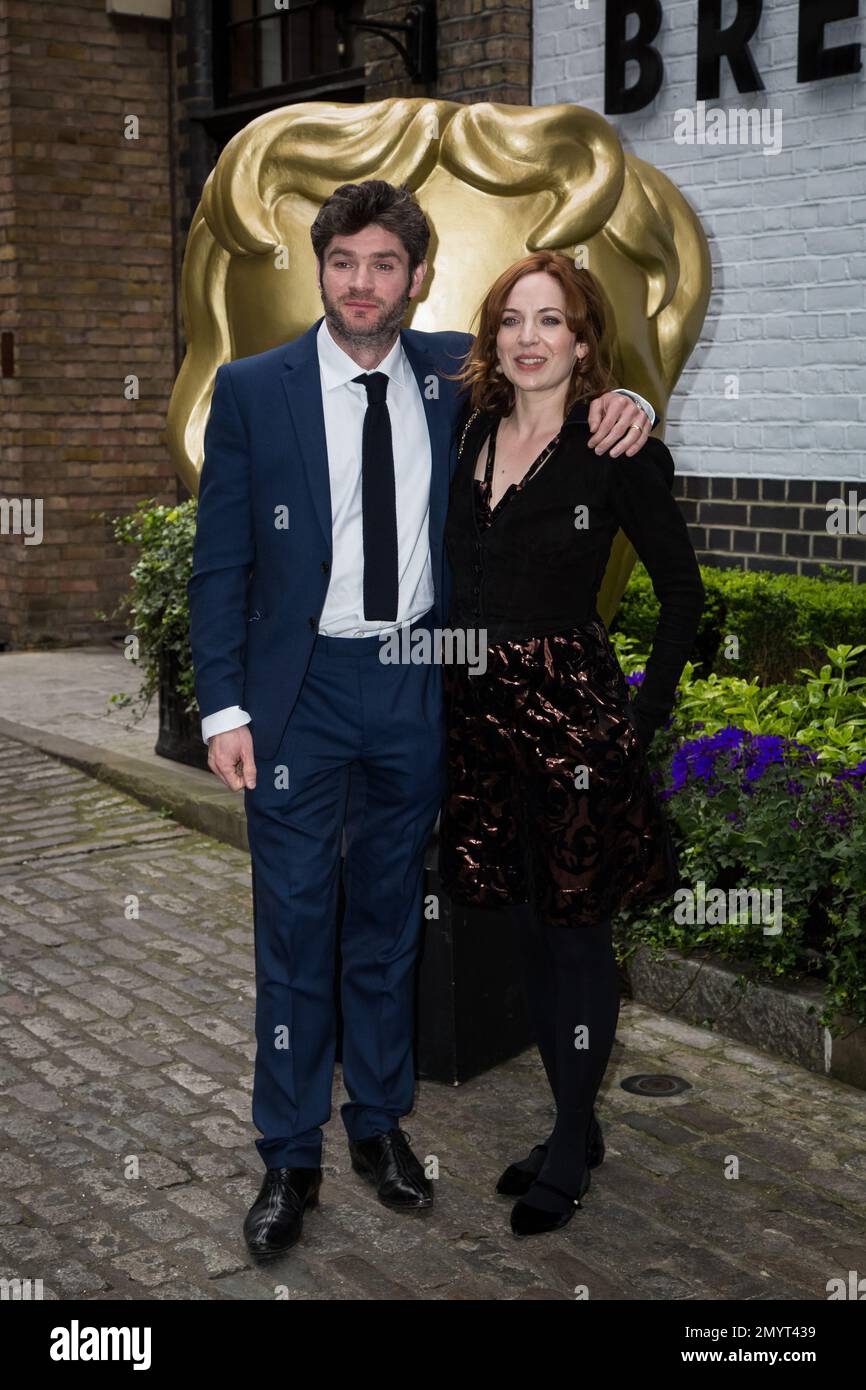 Harry Peacock and Katherine Parkinson pose for photographers upon ...