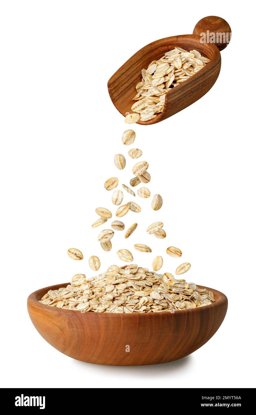 oatmeal falling from oat ears in bowl isolated on white Stock Photo - Alamy