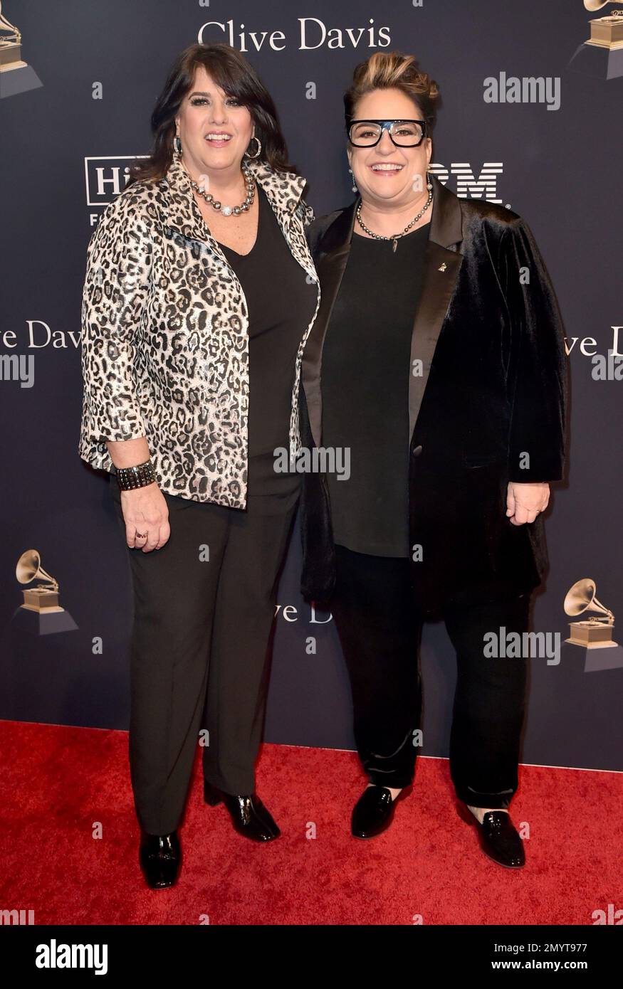 Wendy Cross, left, and Tammy Hurt arrive at the Pre-Grammy Gala on ...