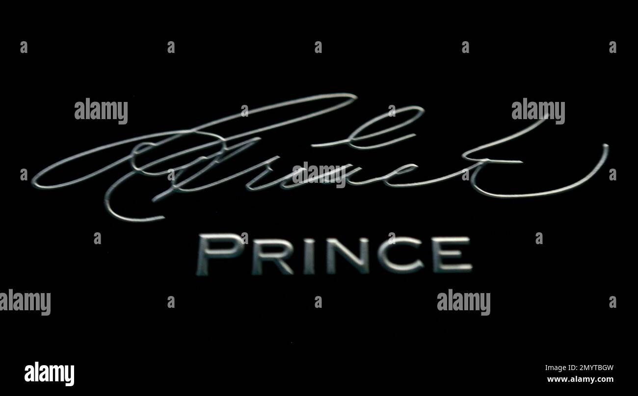 A glass panel etched with the signature of Prince is on display at the ...