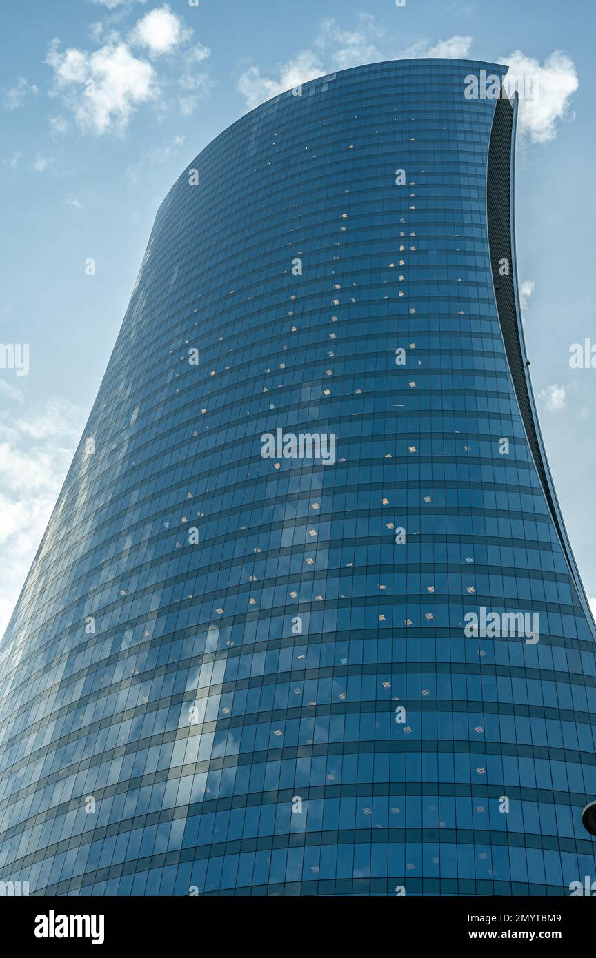 Modern skyscraper, business office building with glass facade. Doha ...