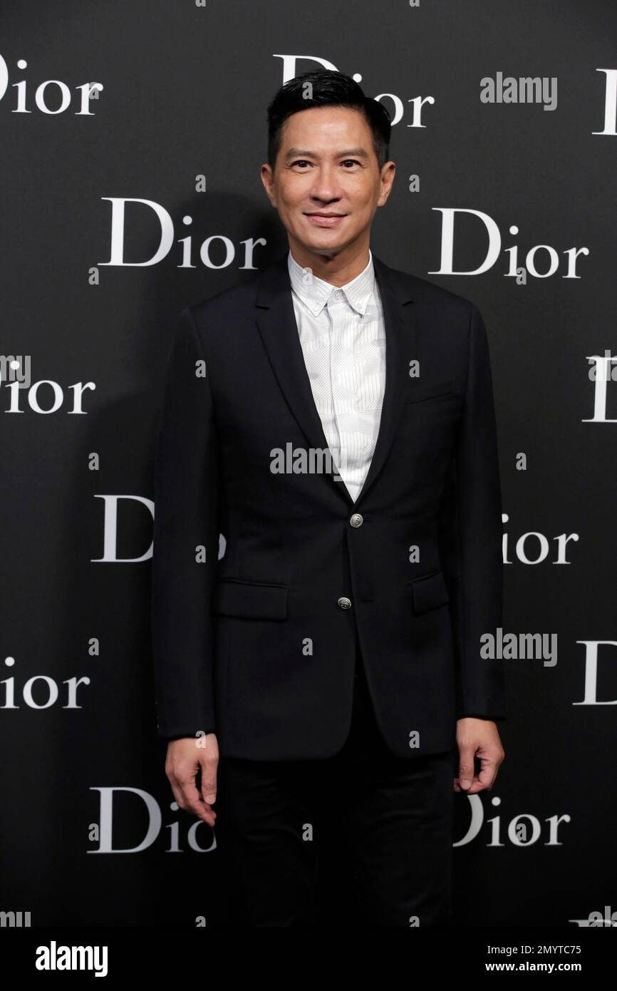 Hong Kong actor Nick Cheung Ka-fai poses for photographers as he ...
