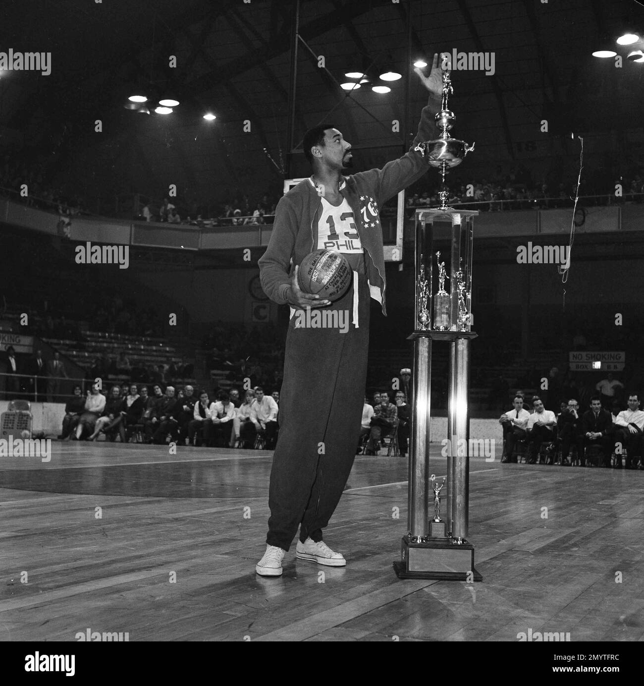 Seven-foot, one-inch wilt Chamberlain of the Philadelphia 76ers has to ...