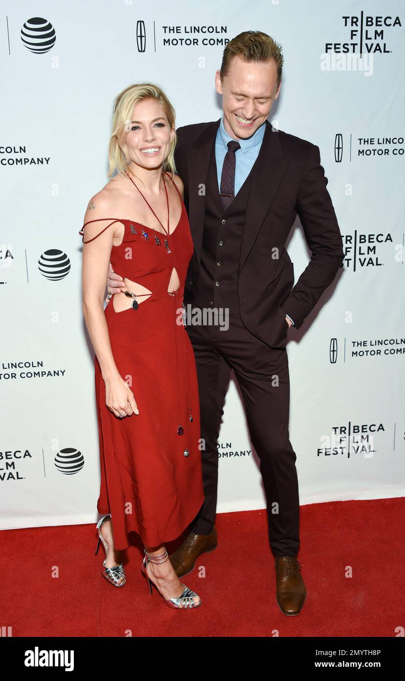 Actors Sienna Miller and Tom Hiddleston attend the premiere for "High ...