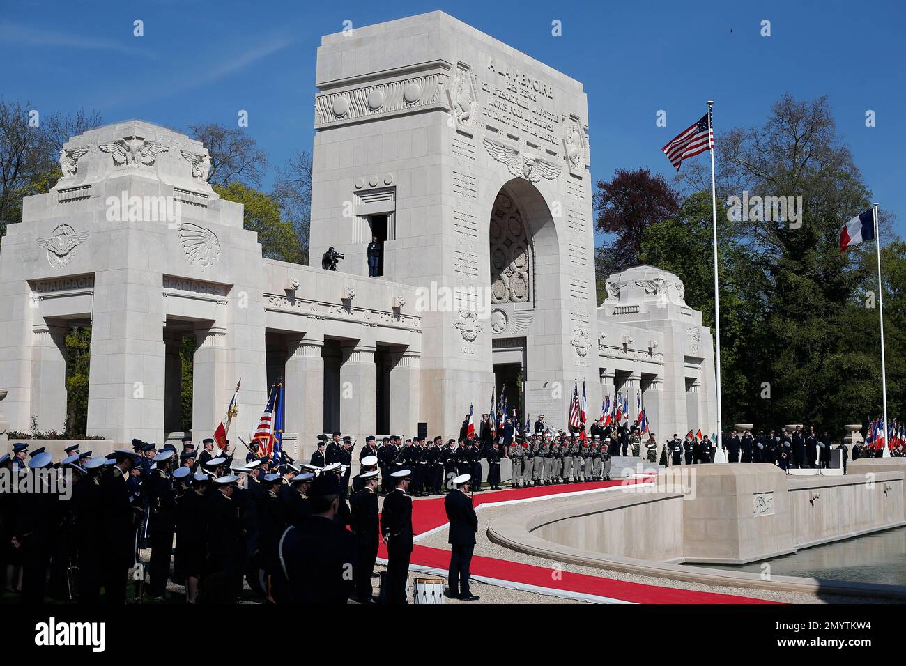 French and American soldiers attend a ceremony honoring the lives of ...