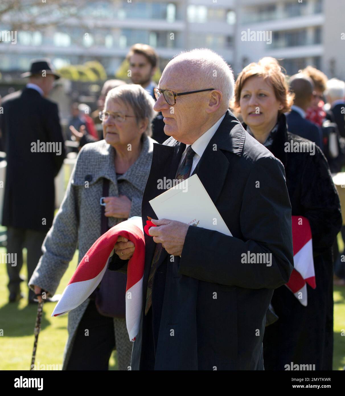 Family members John Howden, center, and Caroline Rowbottom, right, hold ...