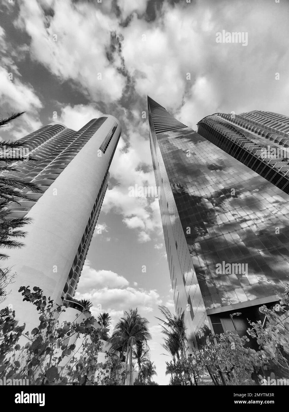 Modern tower buildings architecture bottom view on cloudy sky in city ...