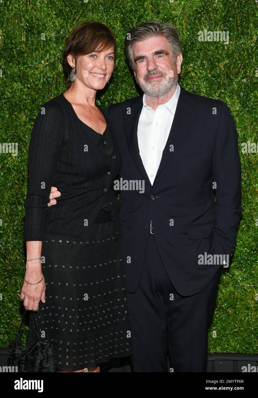 Actress Carey Lowell and boyfriend Tom Freston attend the CHANEL ...
