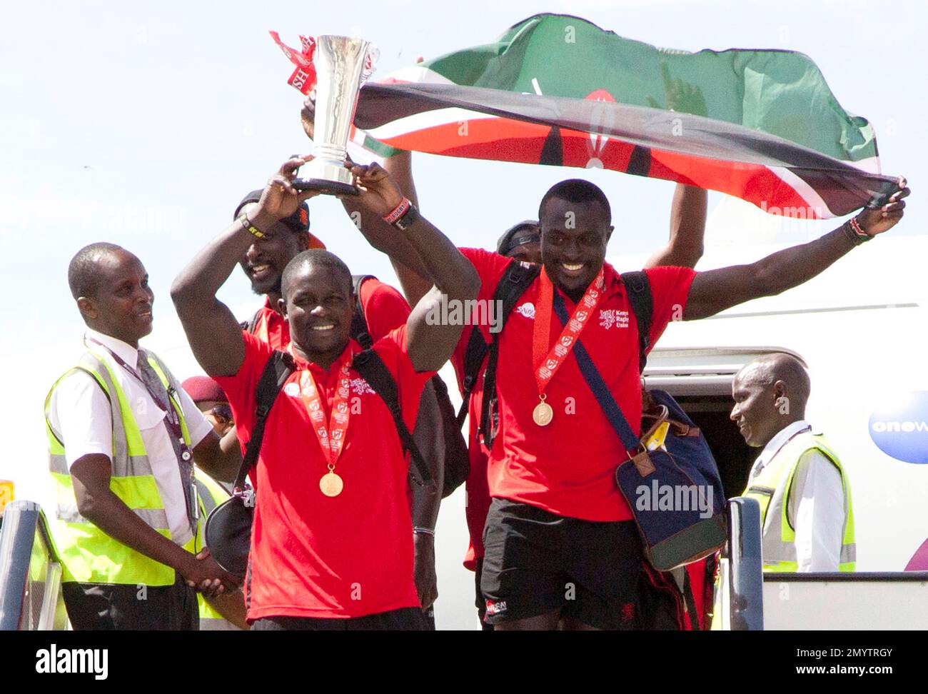 Kenya national rugby sevens team captain Collin Injera, second left ...