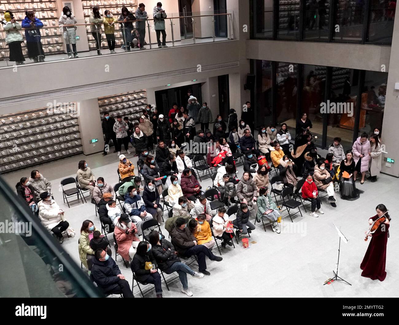 Anyang, China's Henan Province. 4th Feb, 2023. Tourists watch a concert ...