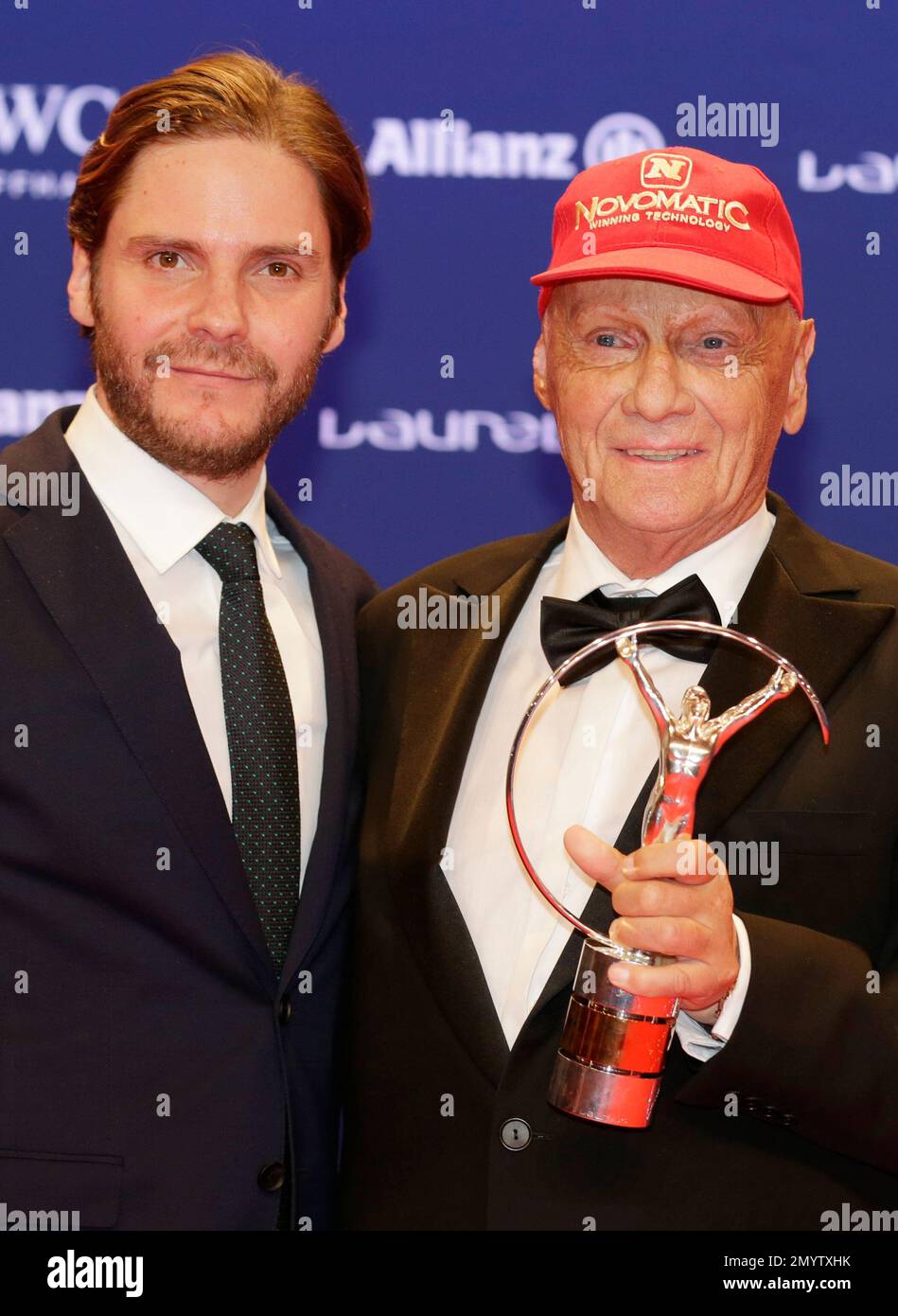 Former Formula One driver Niki Lauda, right, poses with actor Daniel ...