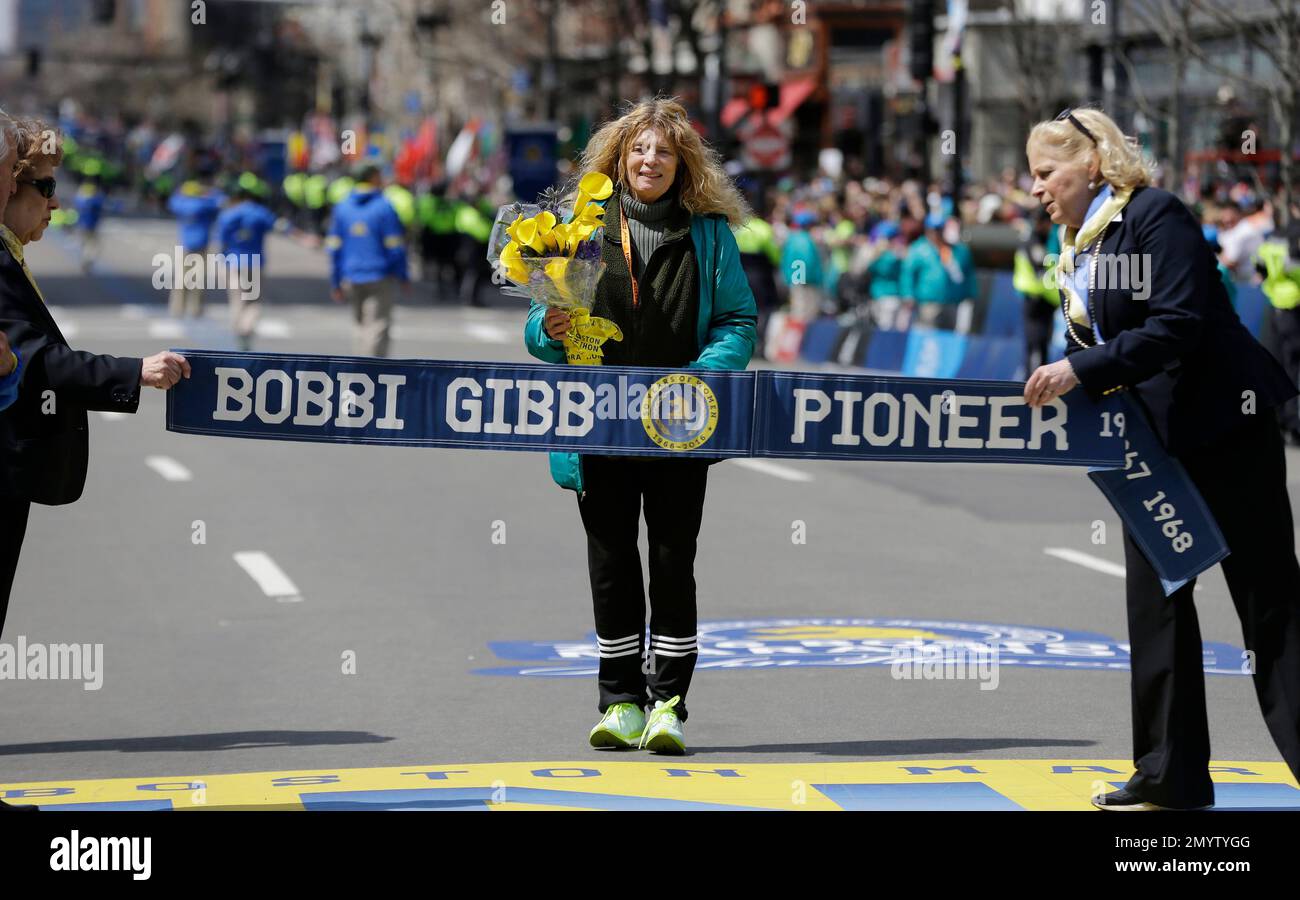Bobbi Gibb, first woman to run the Boston Marathon in 1966, crosses at ...
