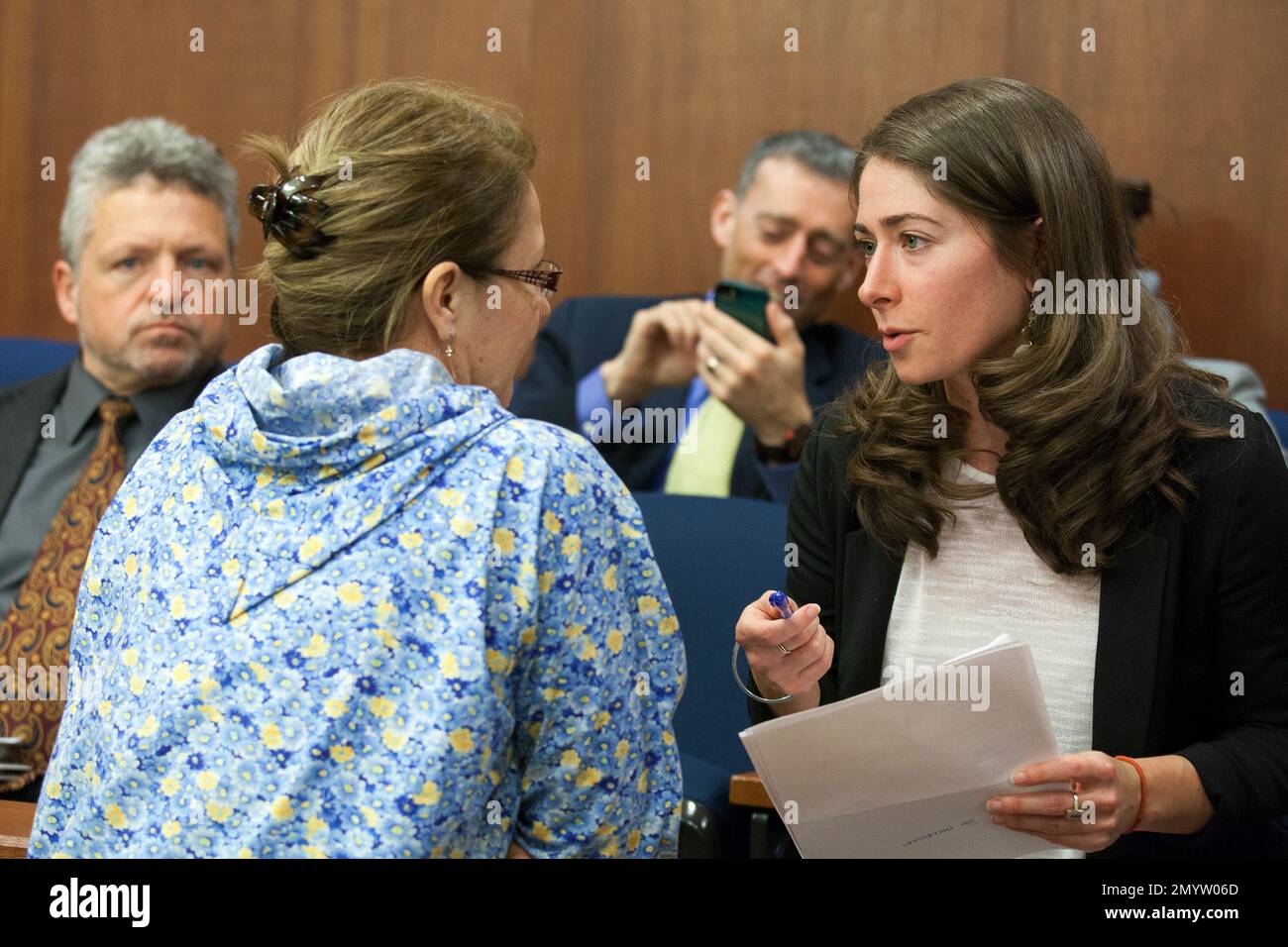 Sen. Anna MacKinnon, R-Anchorage, chats with her aid Erin Shine, during ...