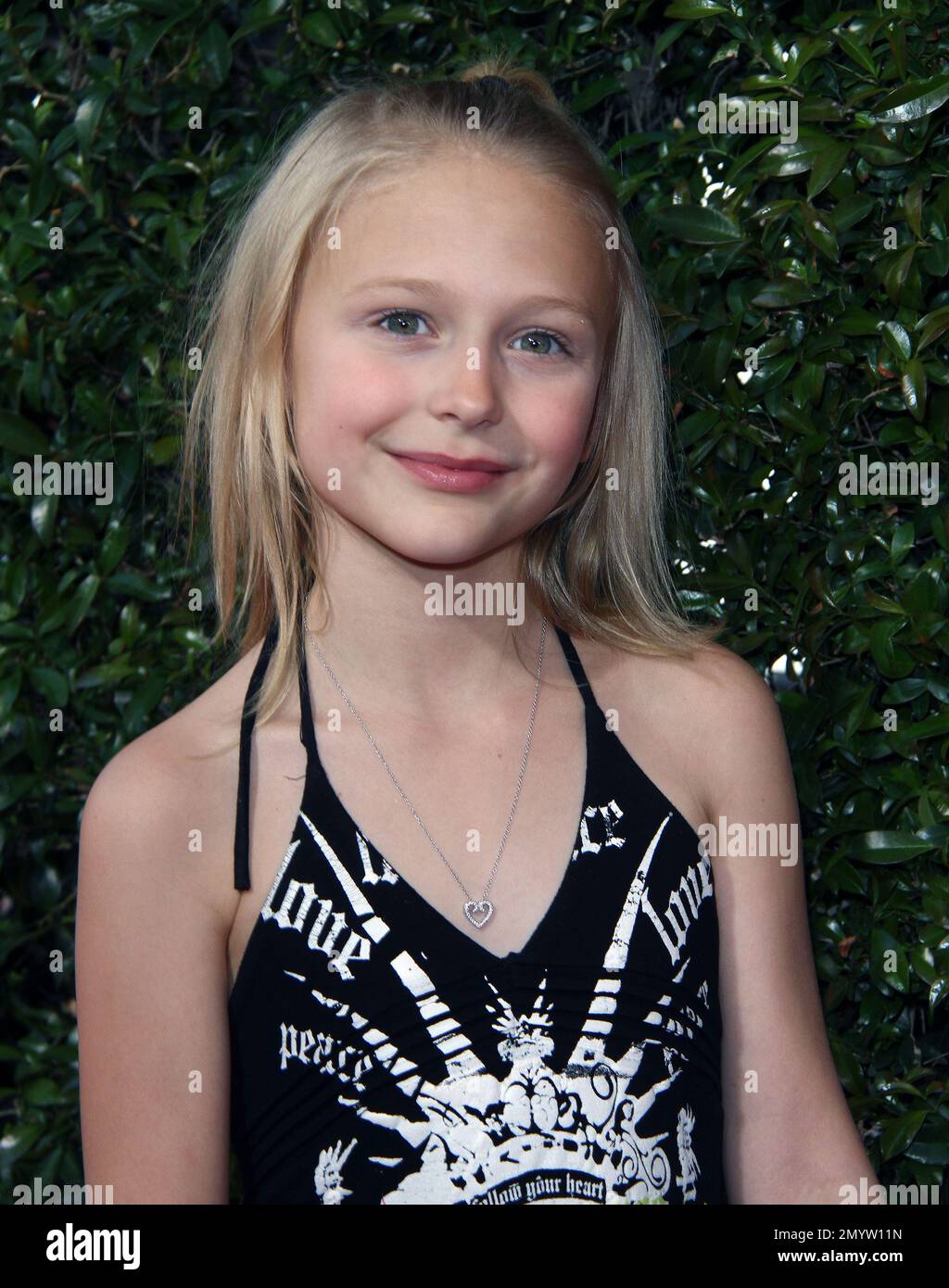 Emily Alyn Lind arrives at the 13th annual Stuart House benefit at John ...