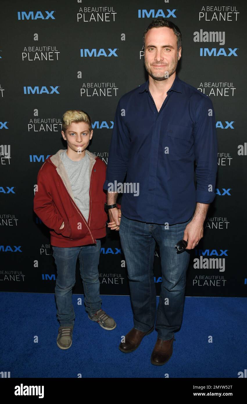 Actor Dominic Fumusa and son attend the premiere of "A Beautiful Planet ...