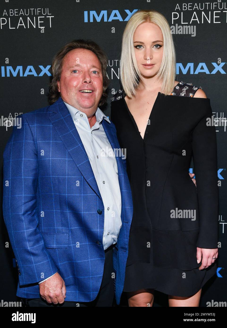 IMAX CEO Richard Gelfond, left, and actress Jennifer Lawrence attend ...