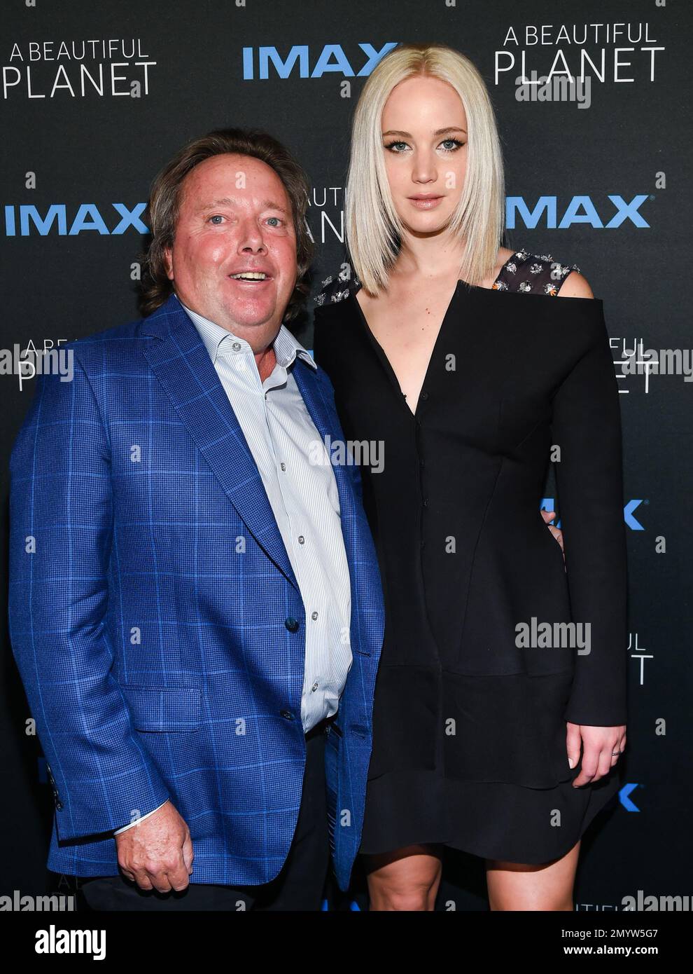 IMAX CEO Richard Gelfond, left, and actress Jennifer Lawrence attend ...
