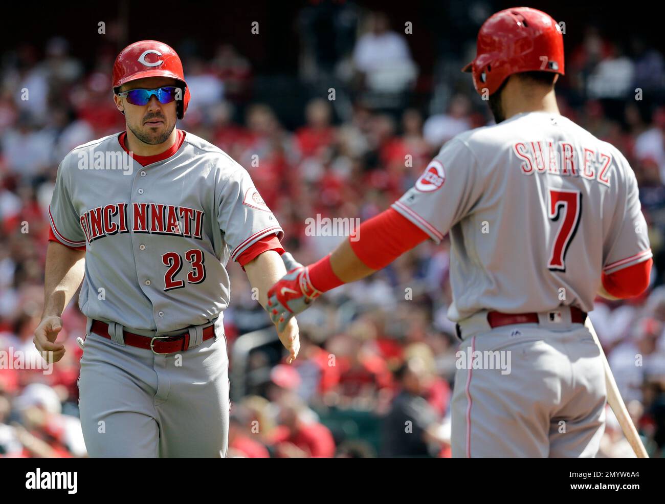 Cincinnati Reds' Adam Duvall, left, is congratulated by teammate ...