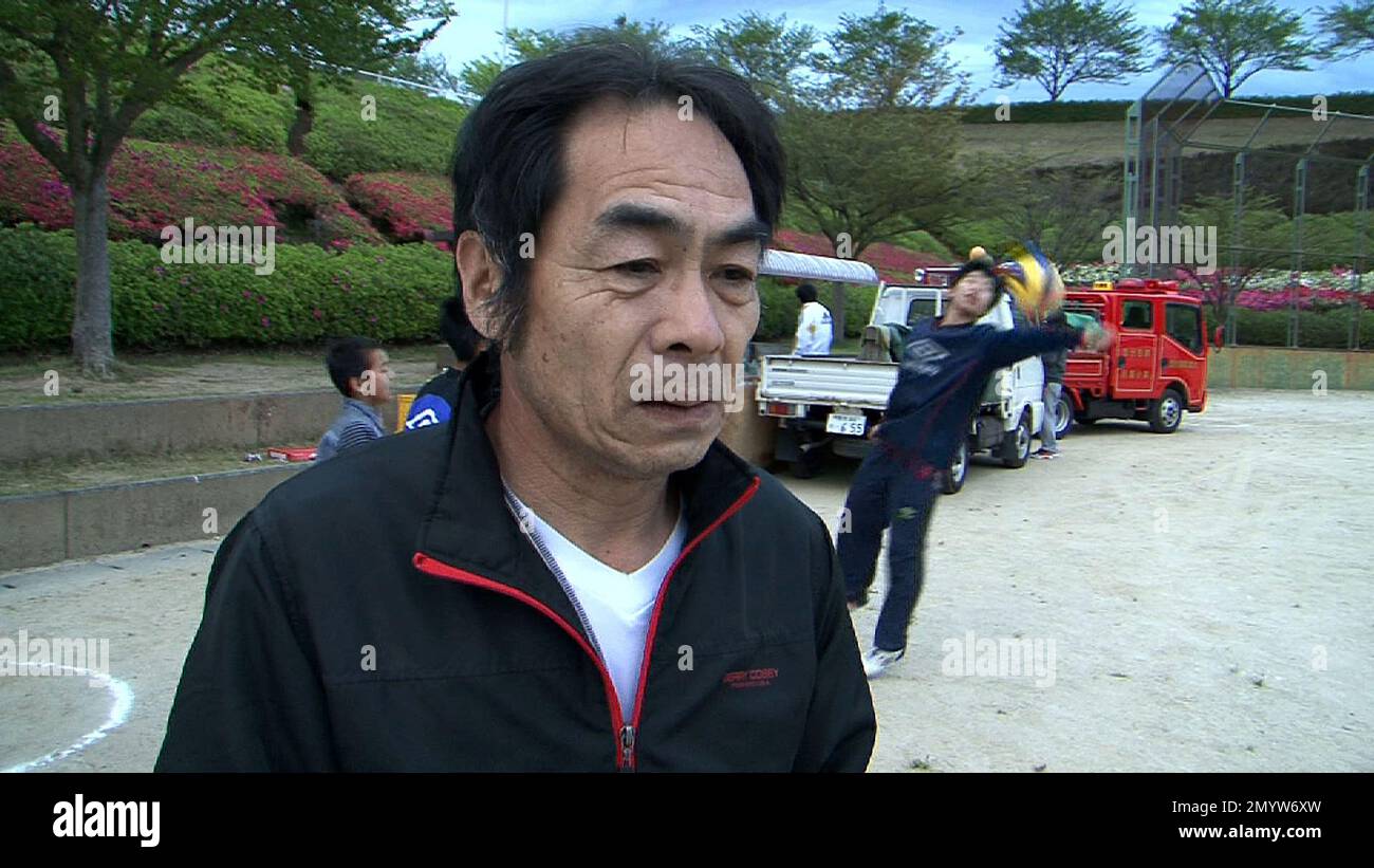 Yoshiaki Tanaka speaks during an interview at a public park in Ozu, Kumamoto prefecture ...