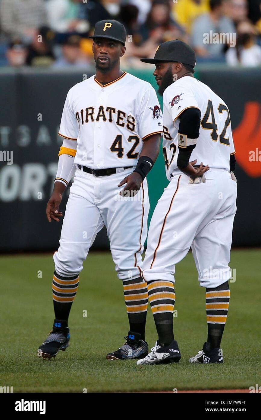 Pittsburgh Pirates' Andrew McCutchen, right, and Josh Harrison warm up ...