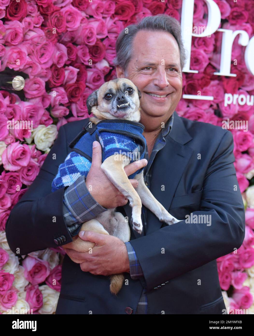 Jon Lovitz and his dog Jerry Bruckheimer III arrive at the Los Angeles ...