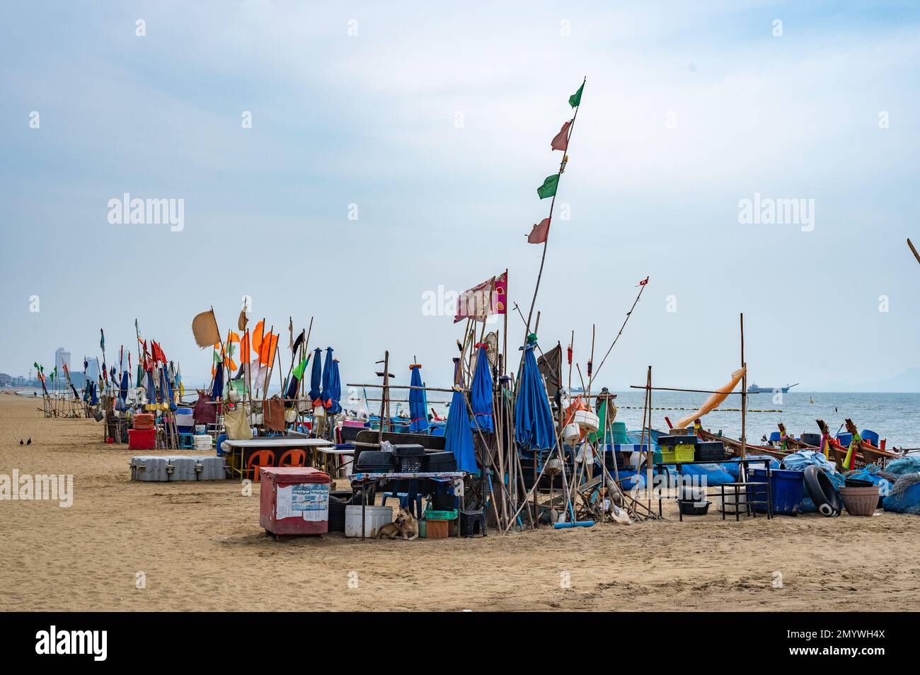 fishing accessories, tools and nets. Fishing nets collected on sand ...