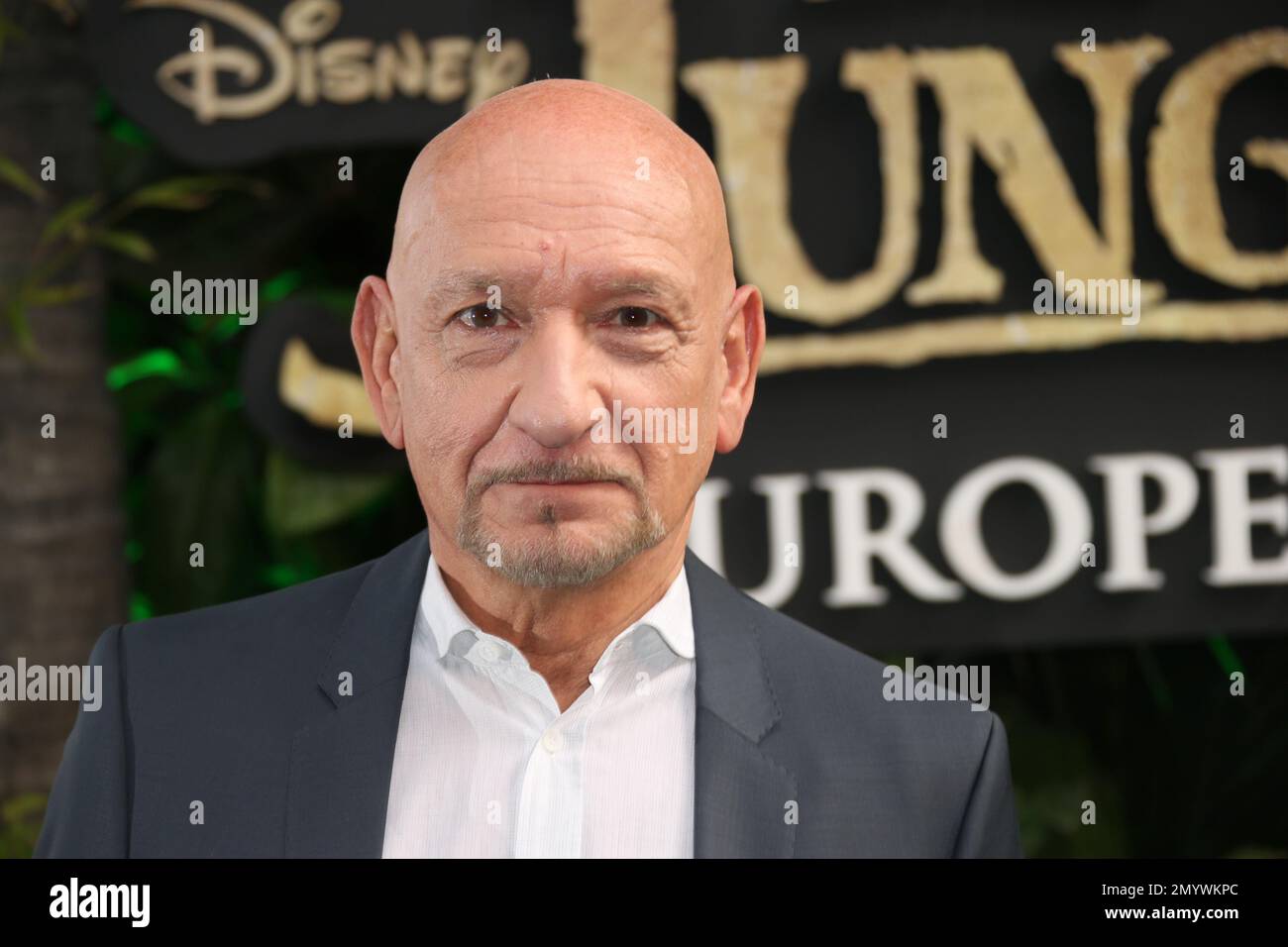 Actor Sir Ben Kingsley poses for photographers upon arrival at the ...