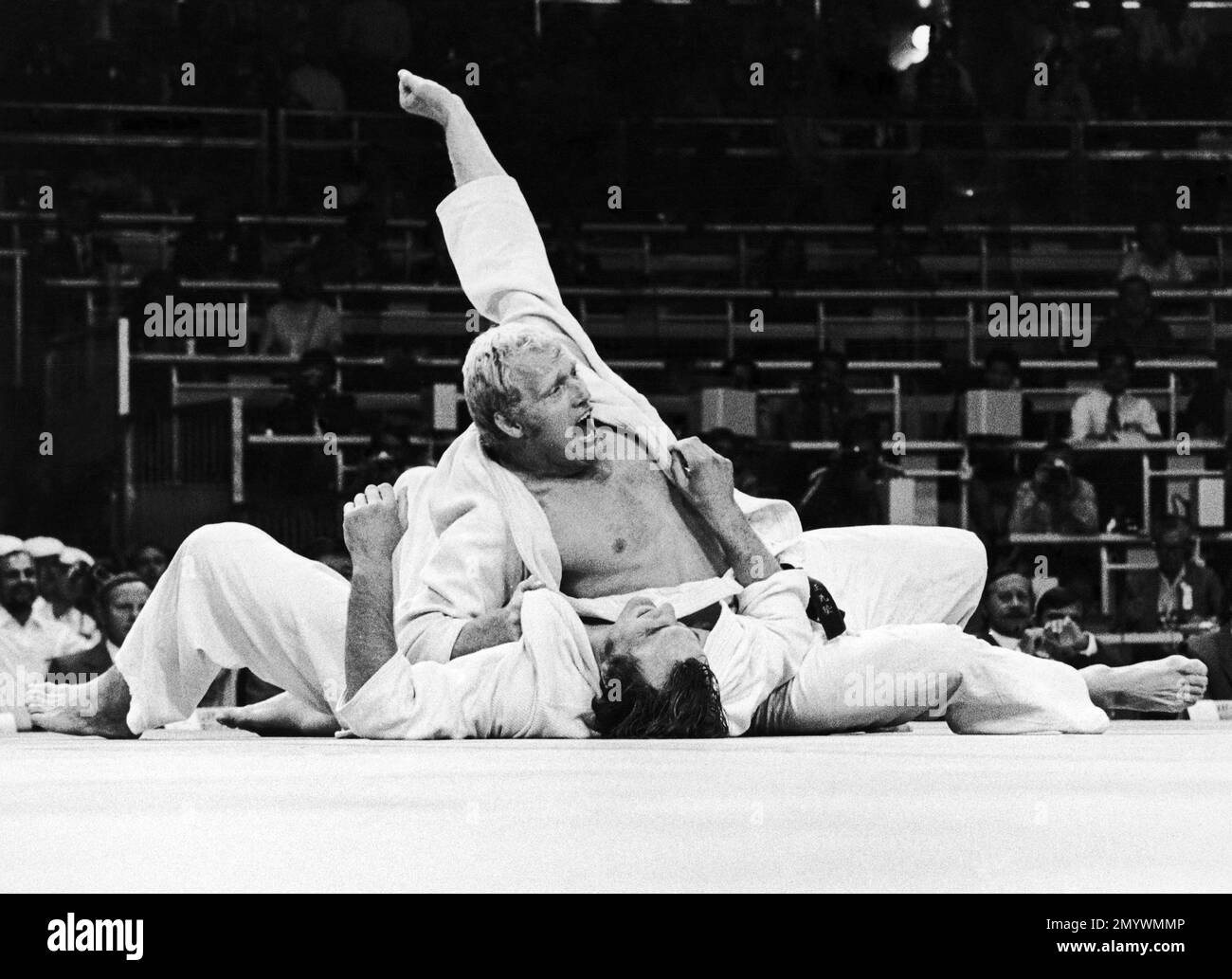 Wim Ruska from the Netherlands raises his arm to victory after he won ...