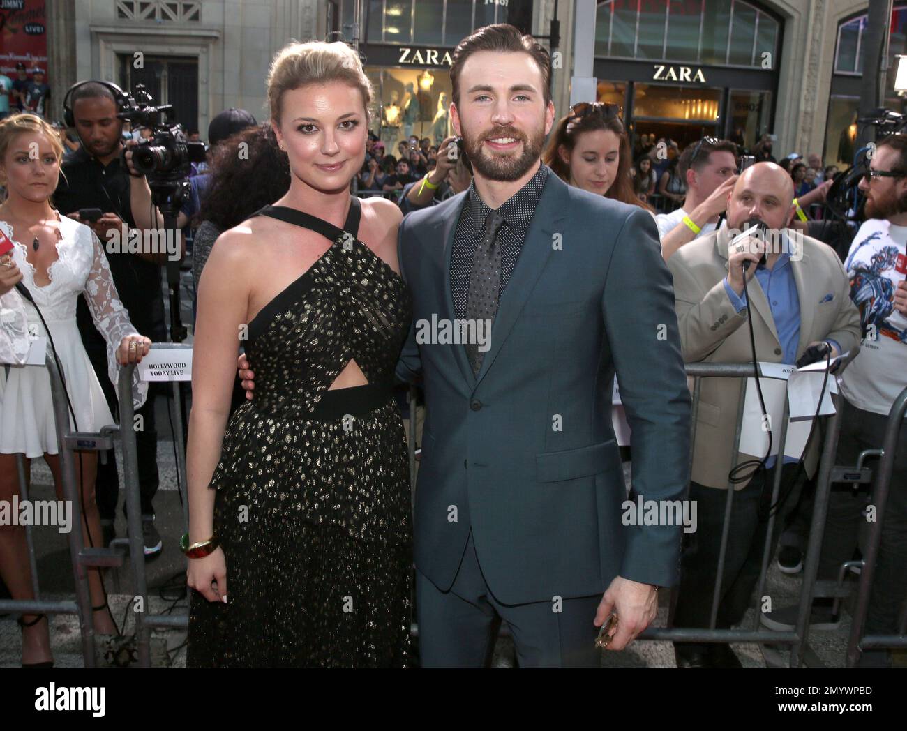 Emily VanCamp, left, and Chris Evans arrive at the Los Angeles premiere ...
