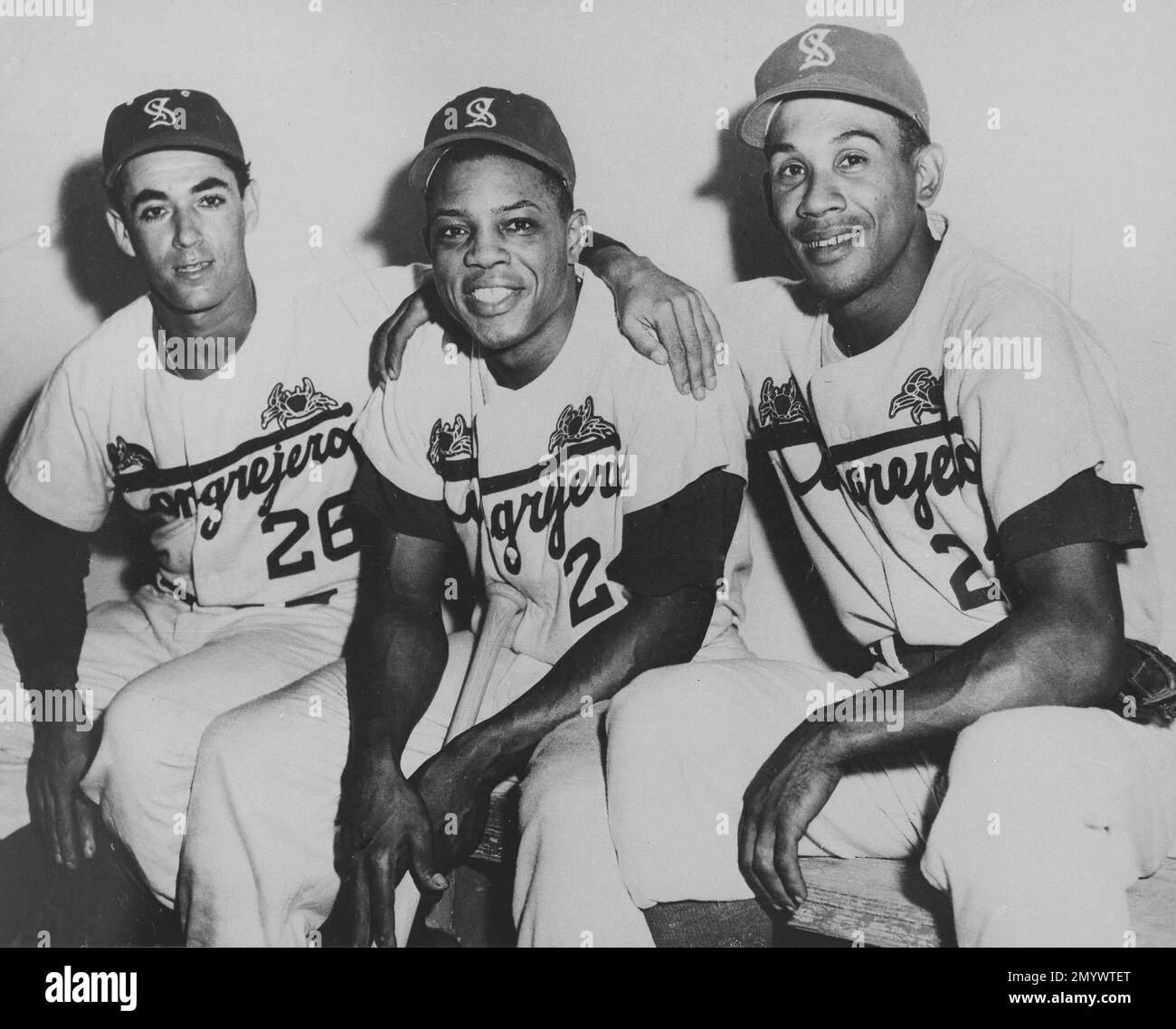 Willie Mays, center, and his teammates, Milton Ralat, left, and Ruben ...