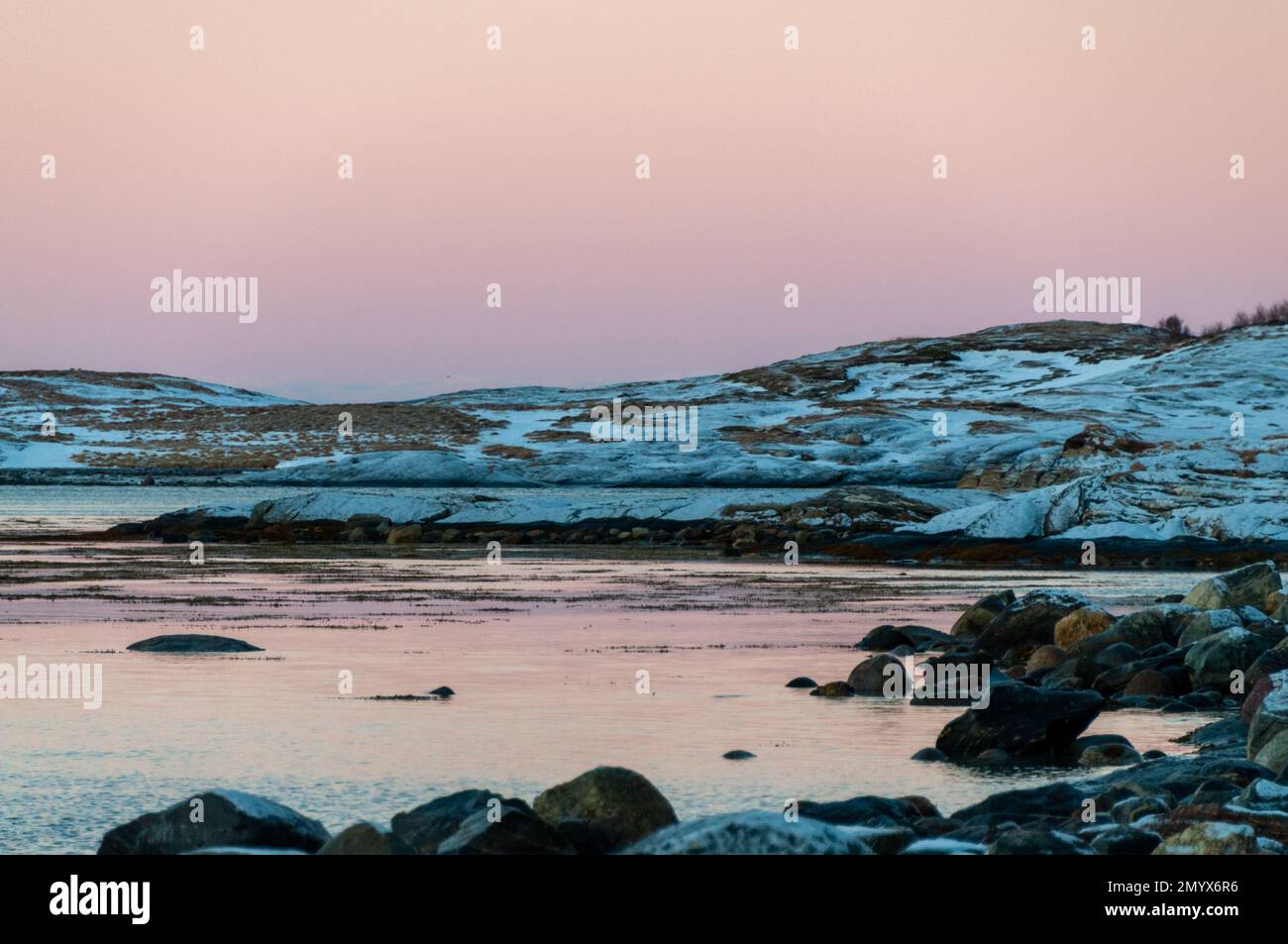 Landscape shot highlighting the rugged mountains and snow-covered ...