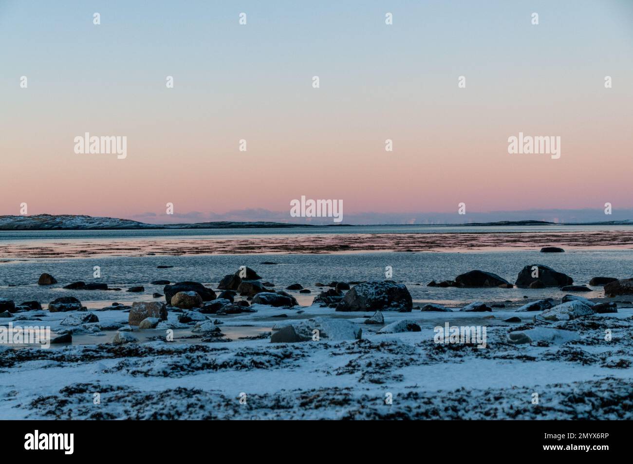 Landscape shot highlighting the rugged mountains and snow-covered ...