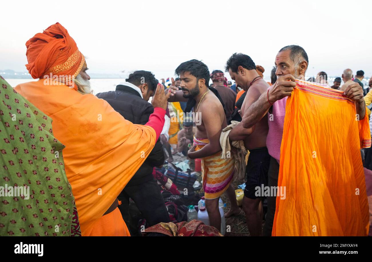 Hindu devotees crowd Sangam, the confluence of rivers the Ganges and the Yamuna during "Maghi ...