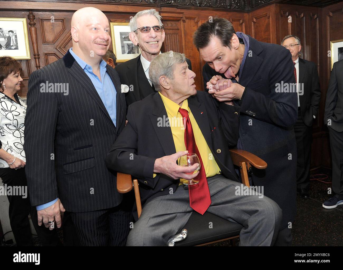 Jeff Ross,from left, Richard Belzer, and Jim Carrey, right, joke with ...