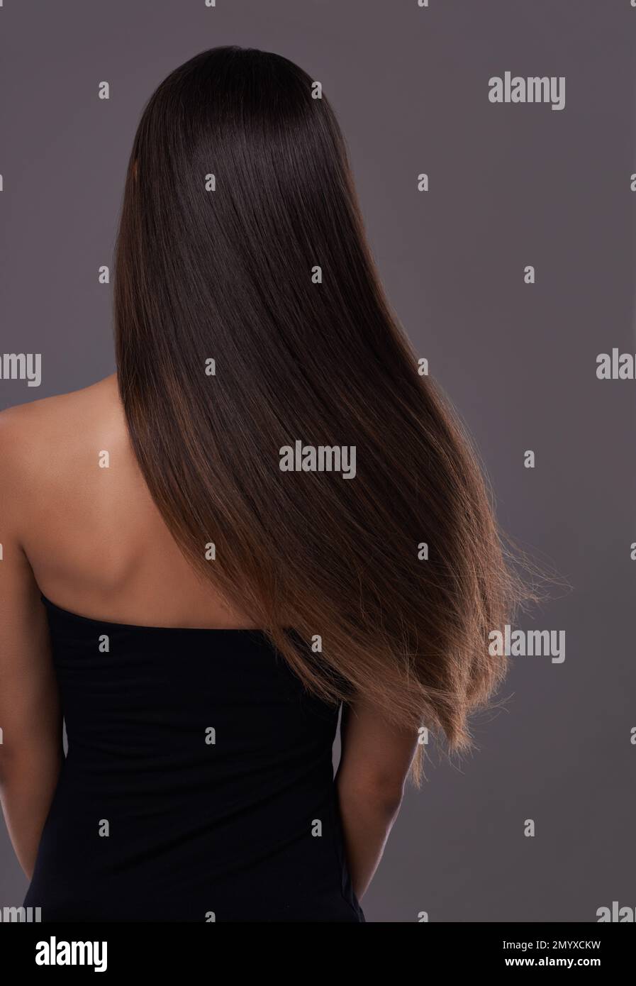 Rear view gorgeous brunette standing hi-res stock photography and ...