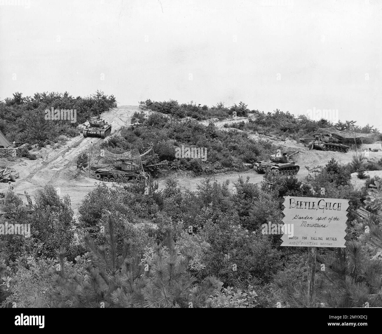 In this handout from the U.S. Navy, four Marine Corps T-46 tanks lay ...
