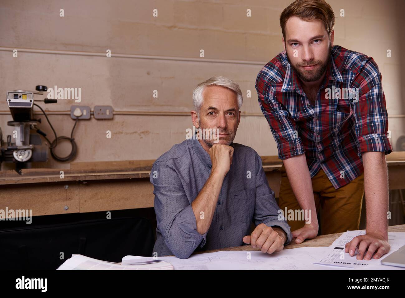 Theyve got a passion for what they do. Portrait of two male architects ...