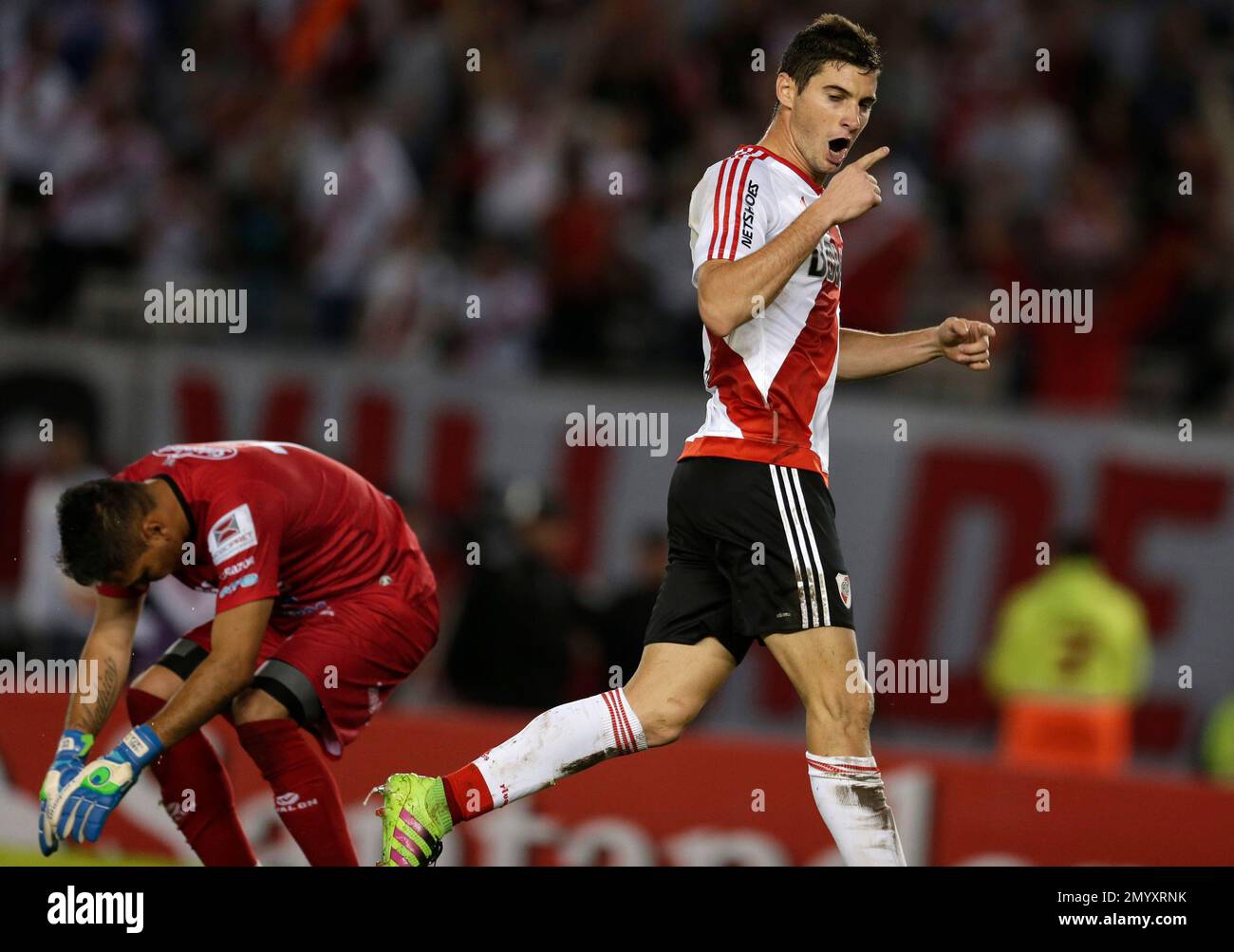 Lucas Alario of Argentina's River Plate, right, celebrates scoring ...