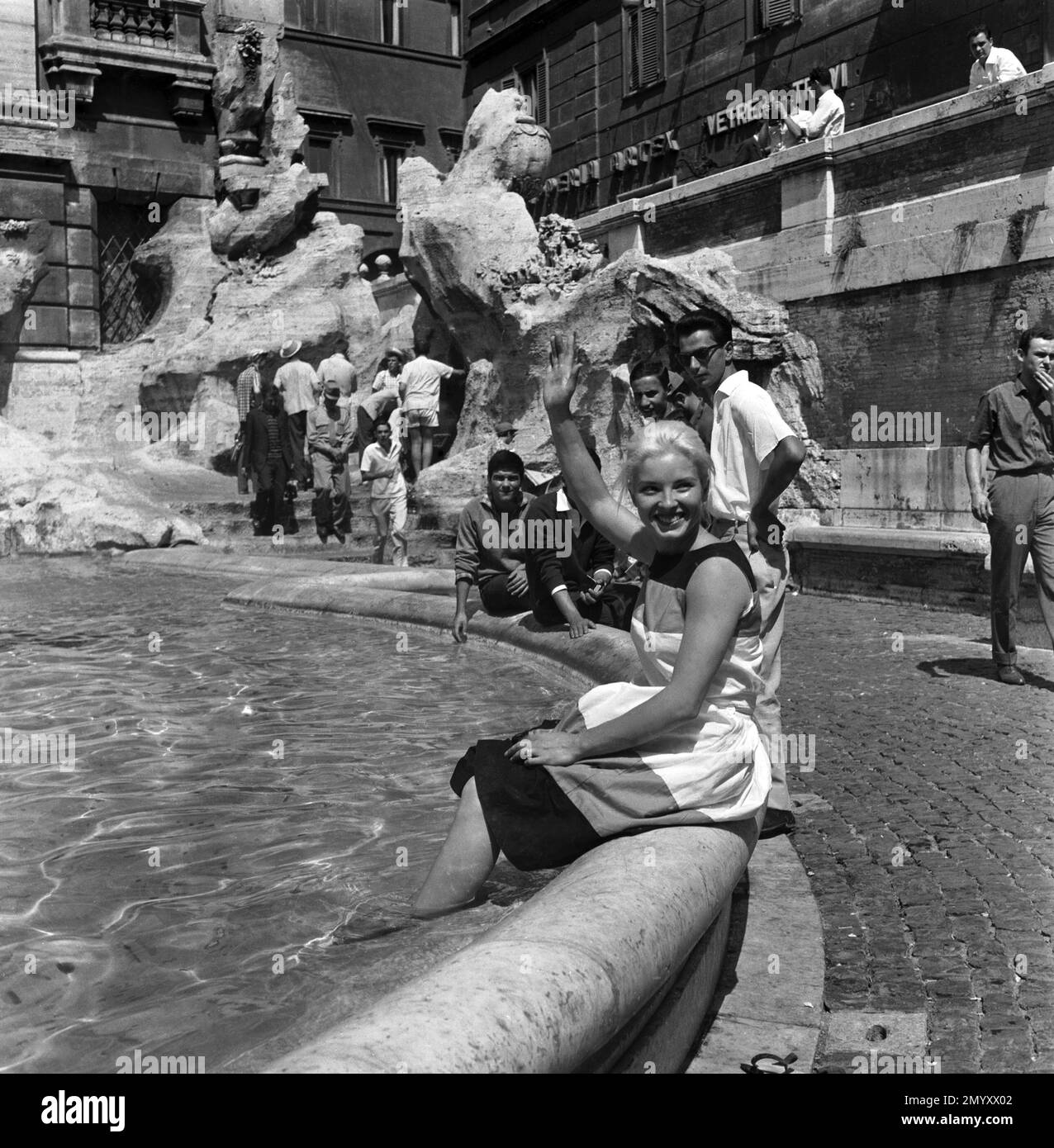 American gymnast Muriel Davis Grossfeld bathes her feet in the Trevi ...