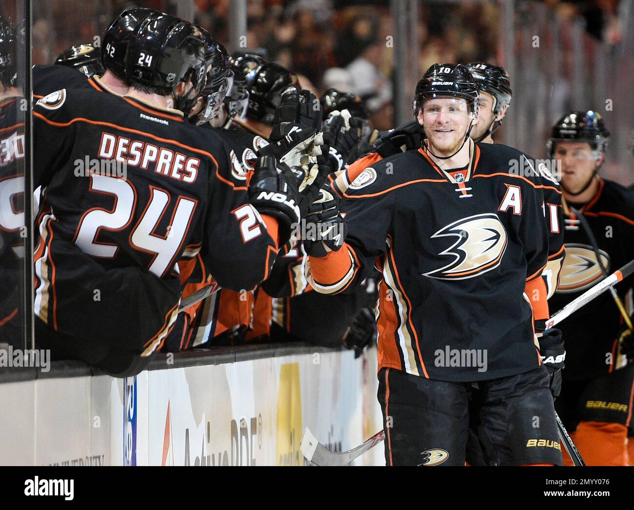 Anaheim Ducks right wing Corey Perry, left, celebrates his first period ...