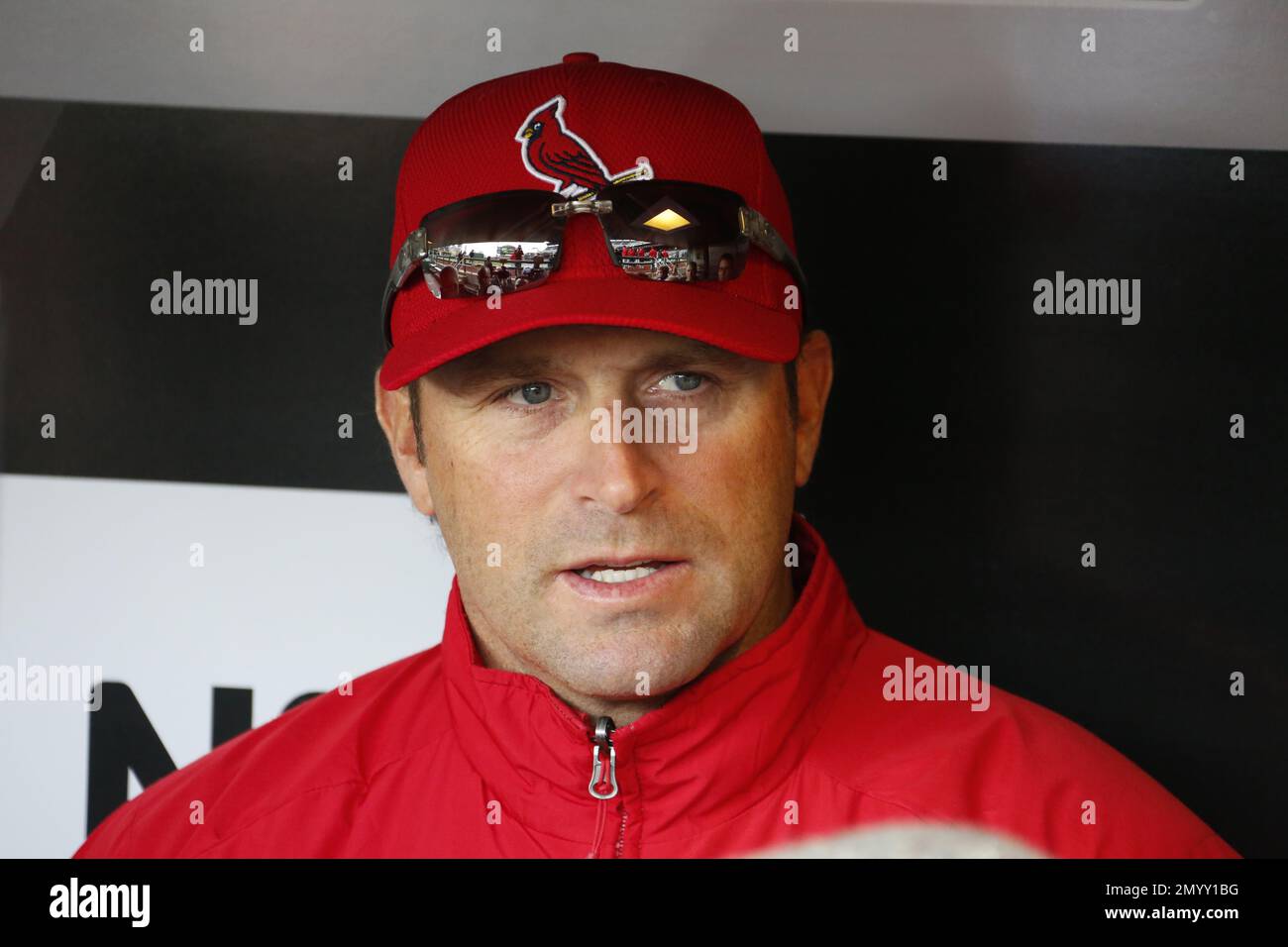 St. Louis Cardinals' manager Mike Matheny talks with media in the ...