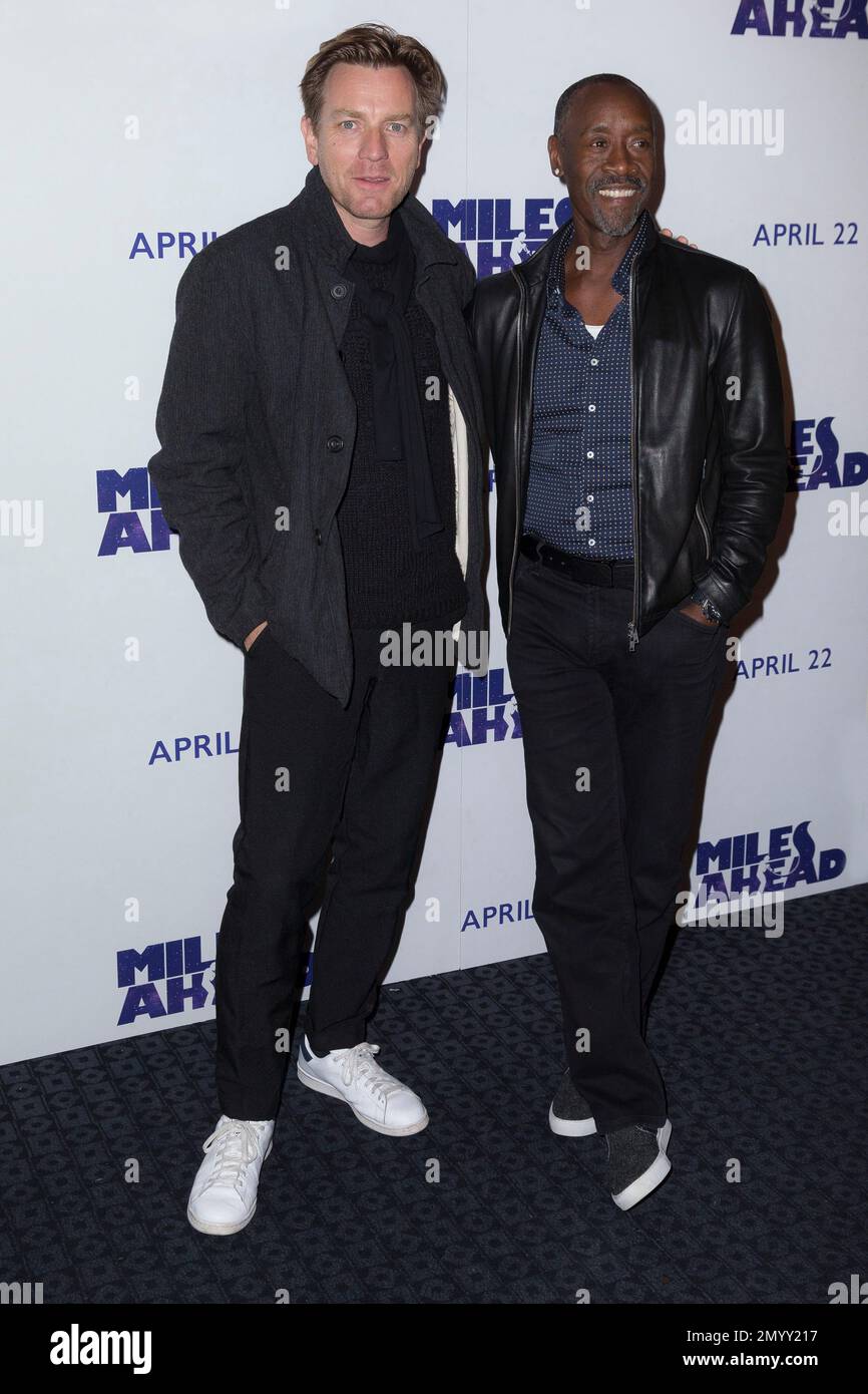 Actor and director Don Cheadle, right, poses for photographers with ...