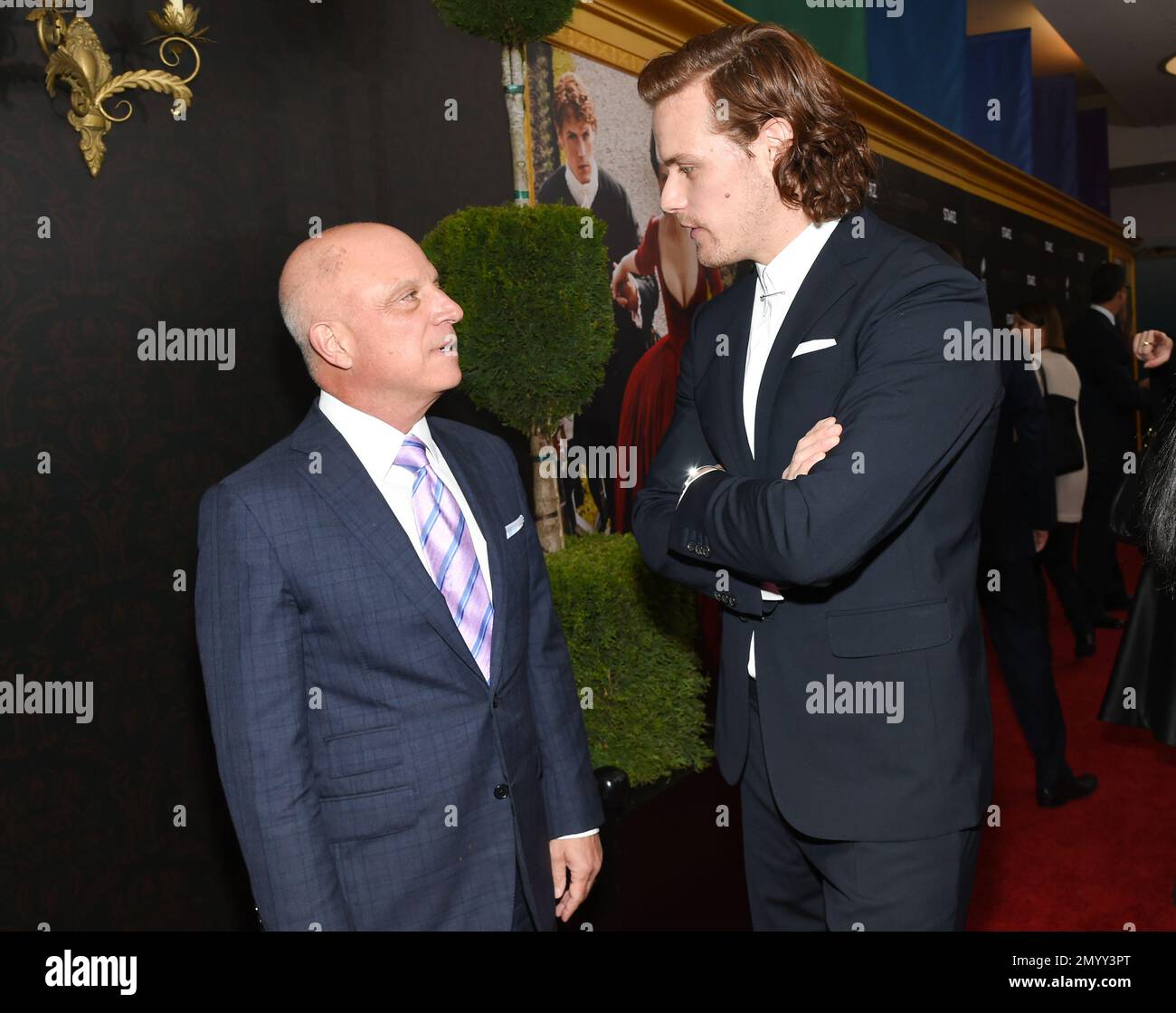 Starz CEO Chris Albrecht, left, and actor Sam Heughan attend the ...