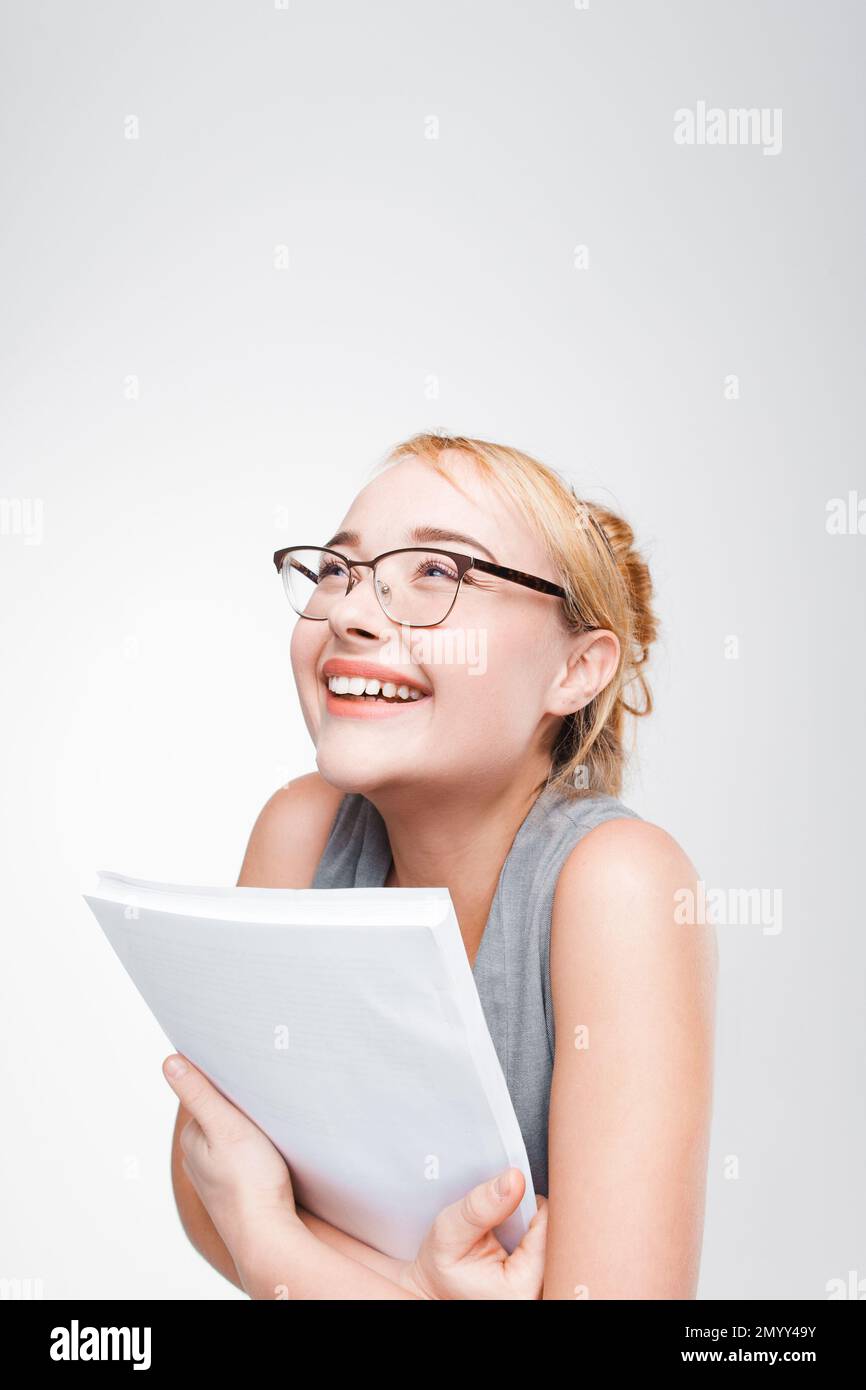 Young smiling blonde happy about great success Stock Photo - Alamy