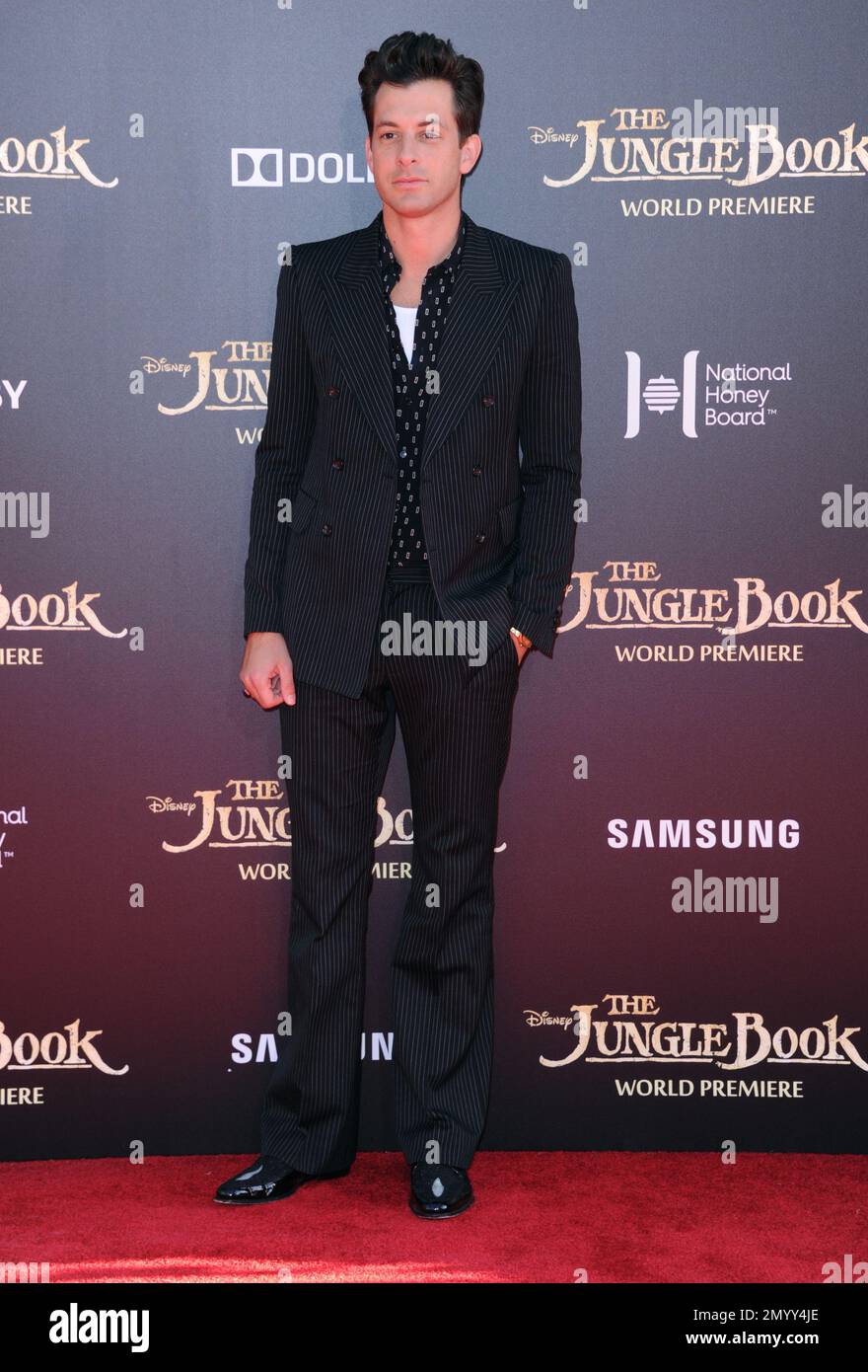 Mark Ronson arrives at the premiere of "The Jungle Book" at the El ...