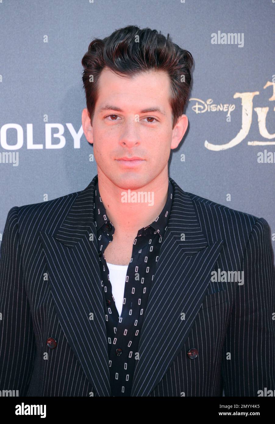 Mark Ronson arrives at the premiere of "The Jungle Book" at the El ...