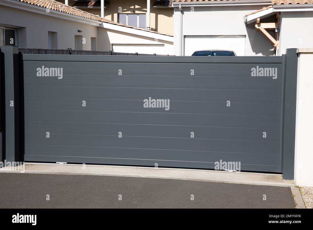 sliding portal gray high large metal gate grey fence on modern suburb ...