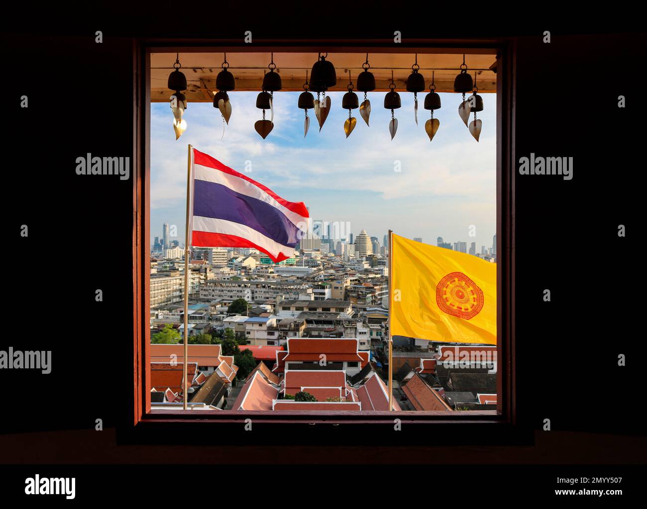 View of Bangkok and National Thai flag and Buddhist flags with circle ...